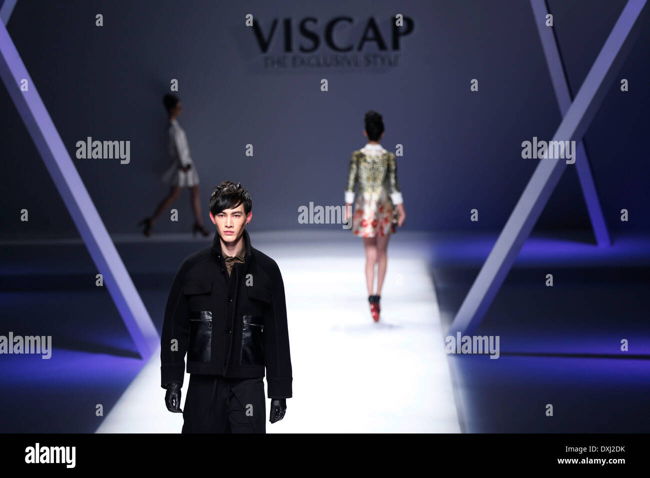 Beijing, China. 27th Mar, 2014. A model presents a creation of "VISCAP ...