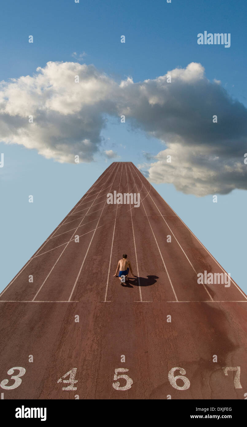 Lone sprinter at starting position on track in clouds (Digital ...