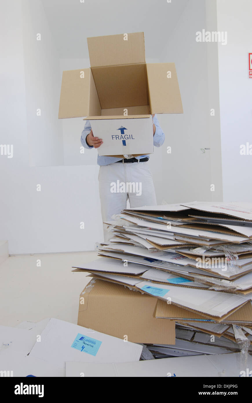 Man holding empty cardboard box Stock Photo - Alamy