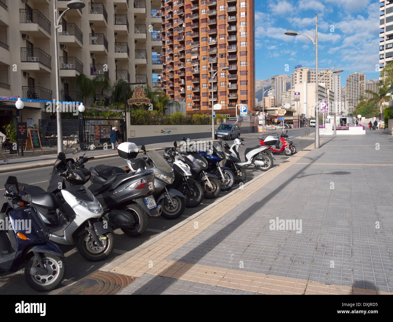 Scooters parked up in a line in Benidorm, Spain Stock Photo - Alamy