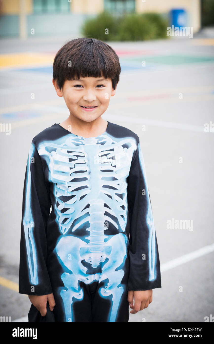 Portrait of Hispanic boy smiling in skeleton costume Stock Photo - Alamy