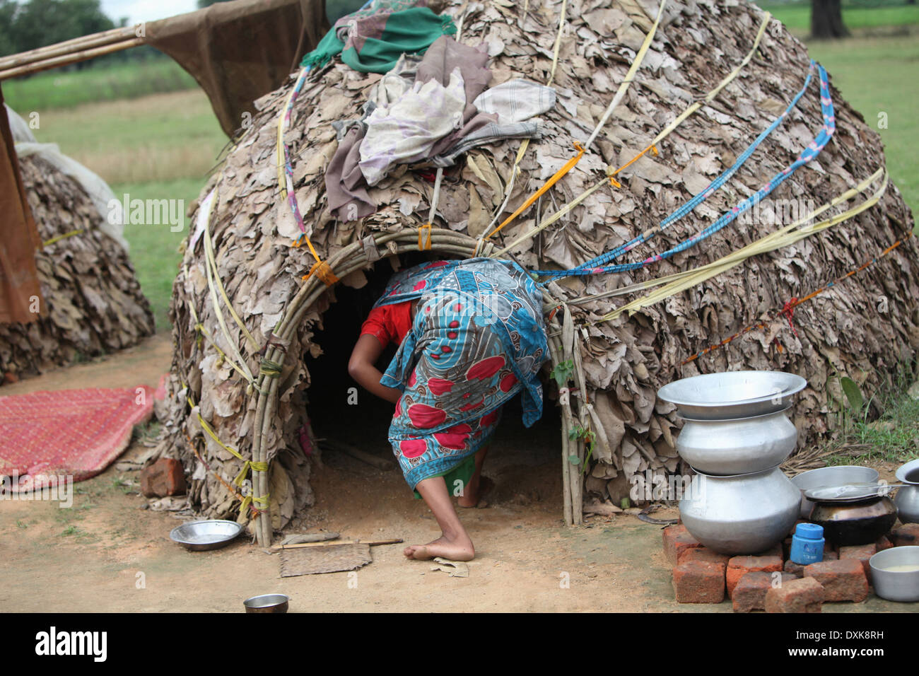Woman entering hut hi-res stock photography and images - Alamy