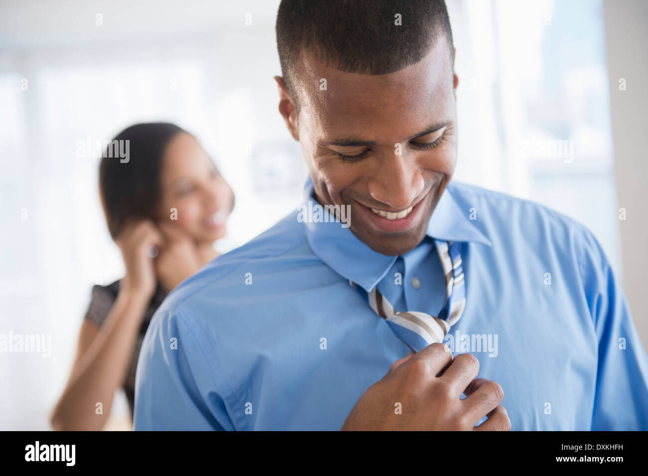 Woman getting dressed shirt hi-res stock photography and images - Alamy