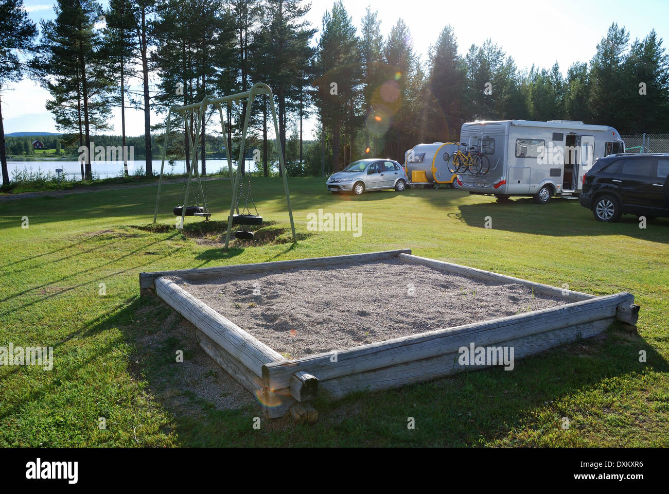 Camping at sunset Stock Photo - Alamy