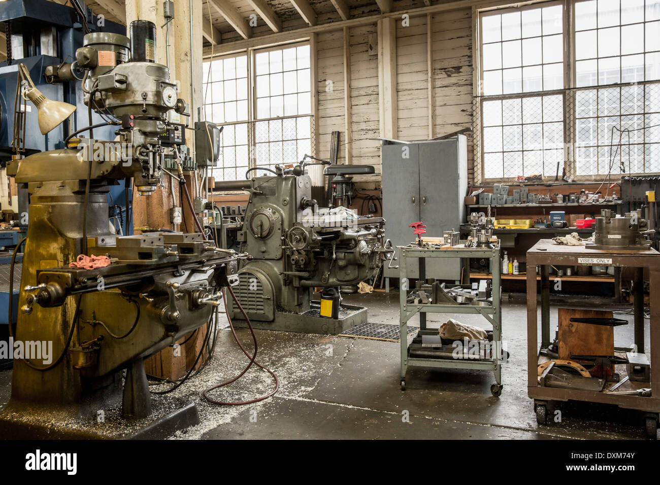 Machinery in metal shop Stock Photo - Alamy