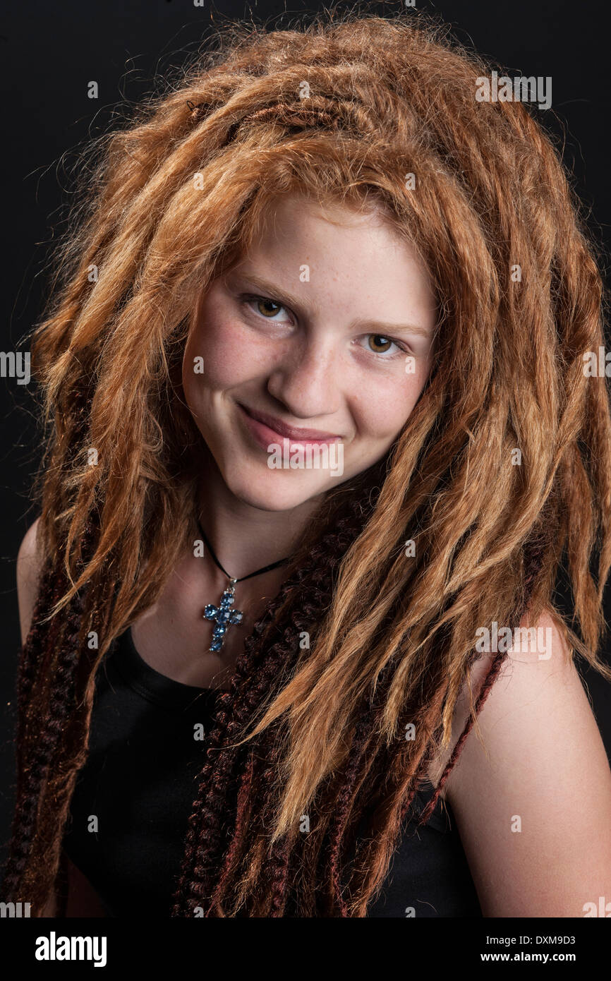 Portrait of teenage girl with red hair dreadlocks Stock Photo - Alamy