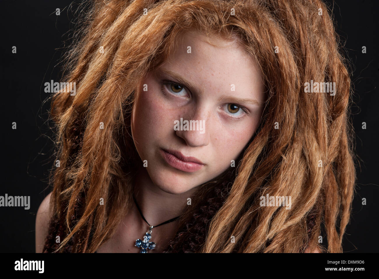 Portrait of teenage girl with red hair dreadlocks Stock Photo - Alamy