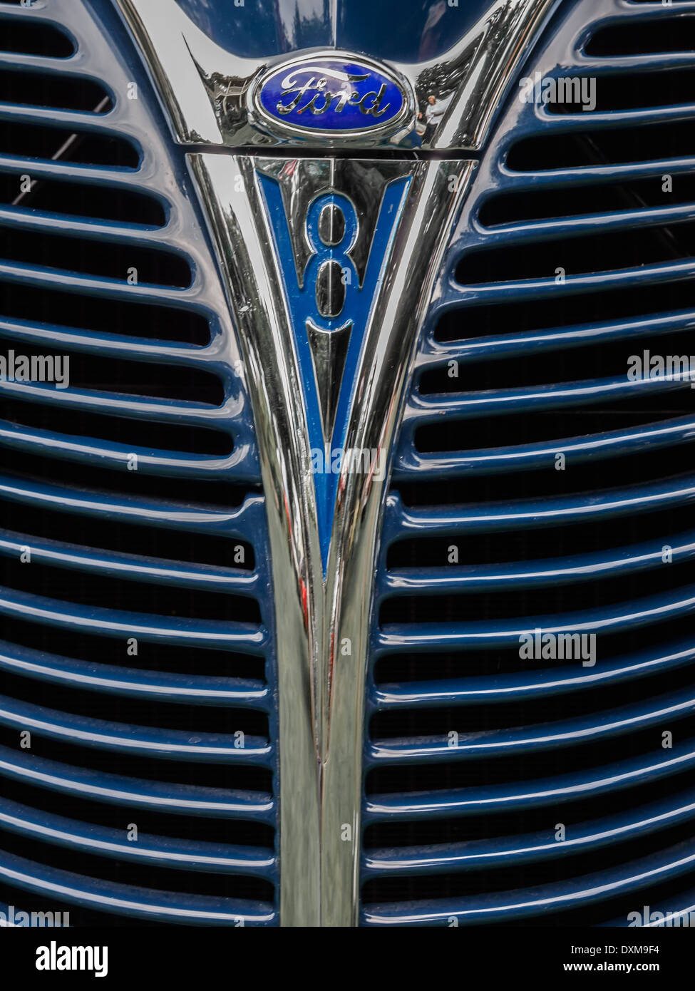 Closeup image of the grill and emblem of a classic Ford Stock Photo - Alamy