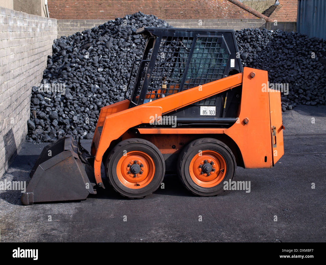 Skid steer loader in coal yard at Paignton Station, Devon, UK Stock ...