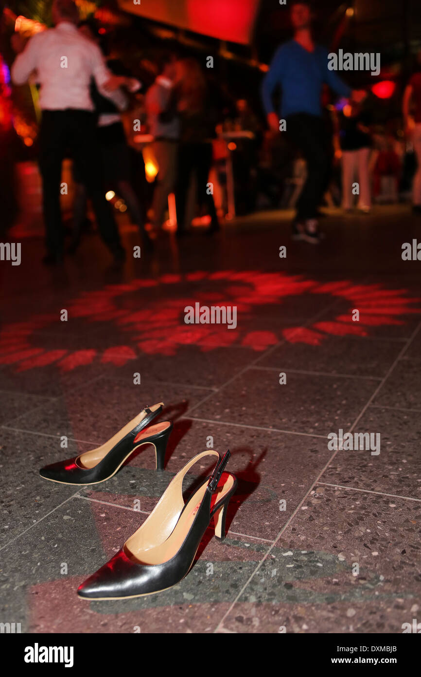 High heels standing on the dance floor of a nightclub Stock Photo - Alamy