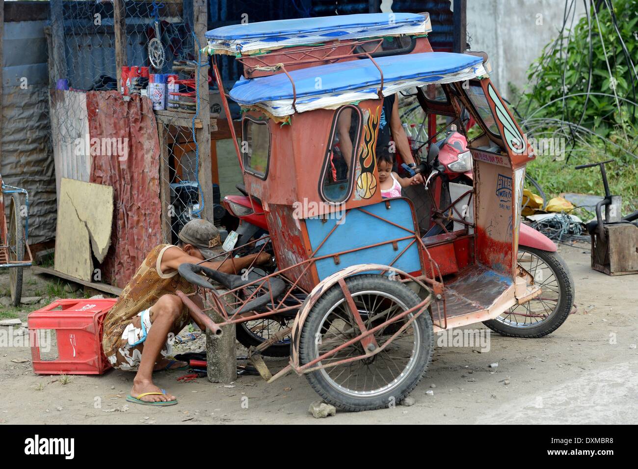 Motorcycle taxi in tacloban city on the Philippines, 10.03.2014 ...
