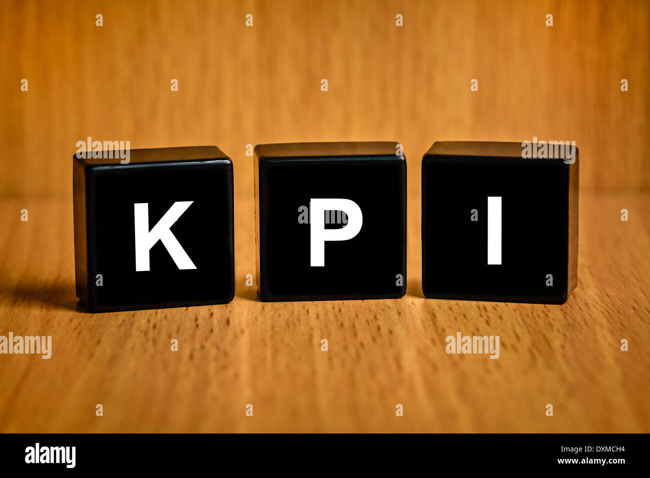 KPI or Key Performance indicator text on black block , business concept ...