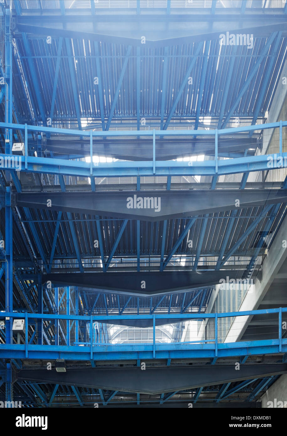 Rows of shelves with boxes in factory warehouse indoor Stock Photo - Alamy