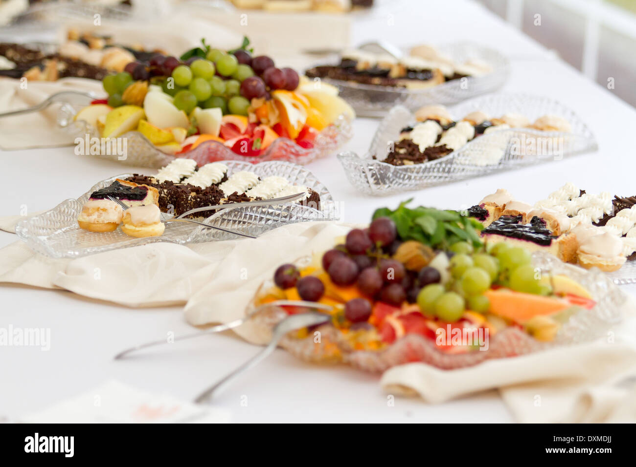 Catering service food buffet selection on white tablecloth Stock Photo ...