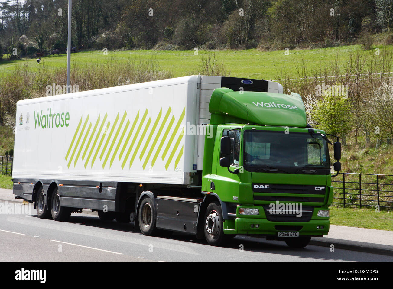 A Waitrose truck traveling on a road in Coulsdon, Surrey, England Stock ...