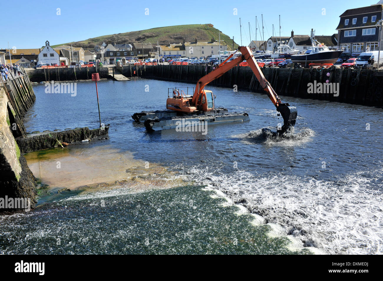 Dredging at West Bay Harbour, Dorset Stock Photo - Alamy