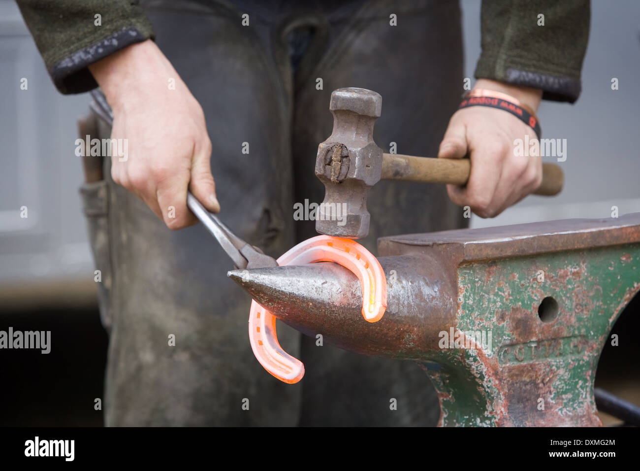 A professional farrier working at a stable in North Lincolnshire ...