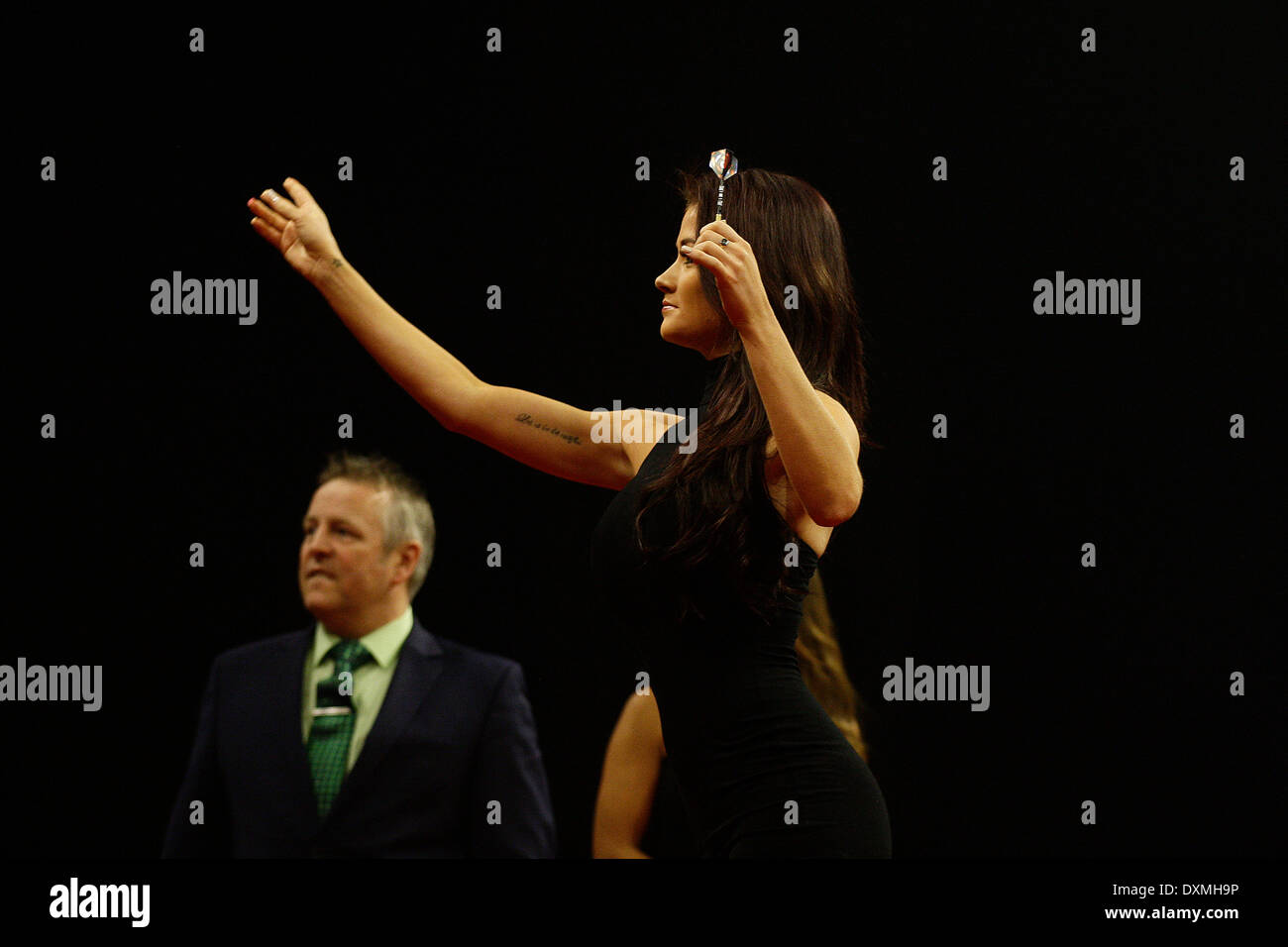 Dublin, Ireland. 27th Mar, 2014. Models playing darts before the start ...