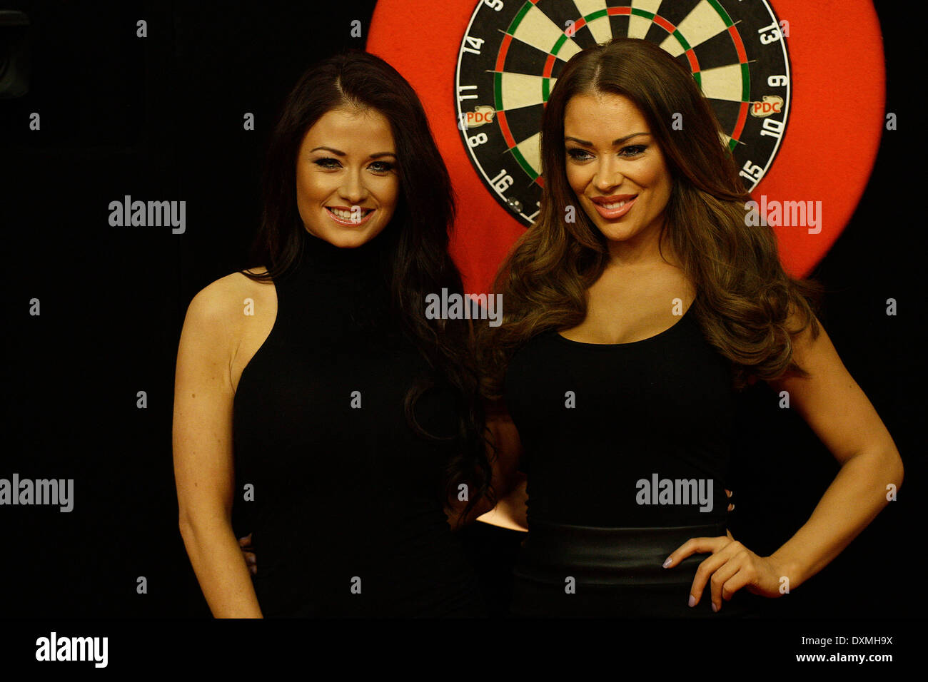 Dublin, Ireland. 27th Mar, 2014. Models playing darts before the start ...