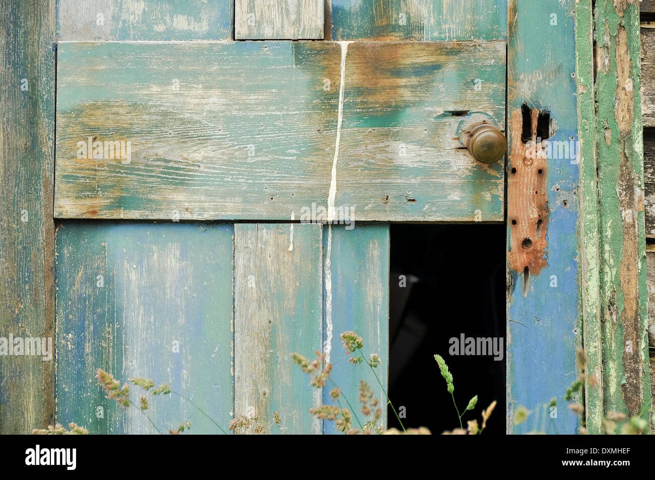 Weathered broken down wooden door Stock Photo - Alamy