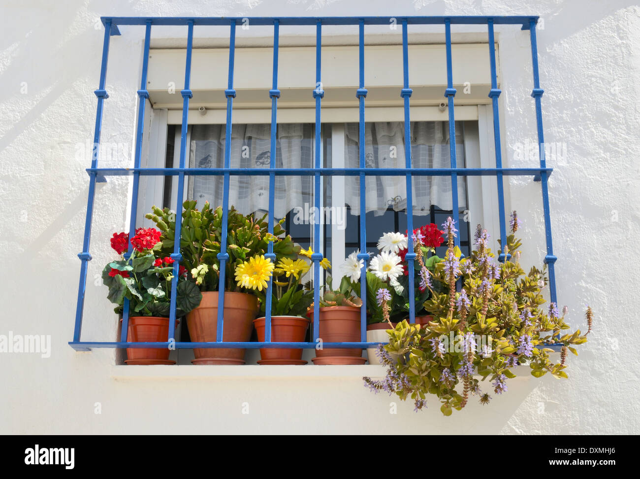 Decorated window with flowers pots in Ojen, Andalusia, Spain Stock ...