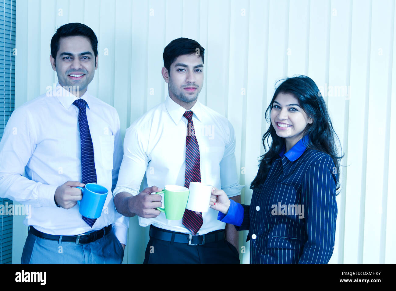 Lady drinking tea at office team hi-res stock photography and images ...