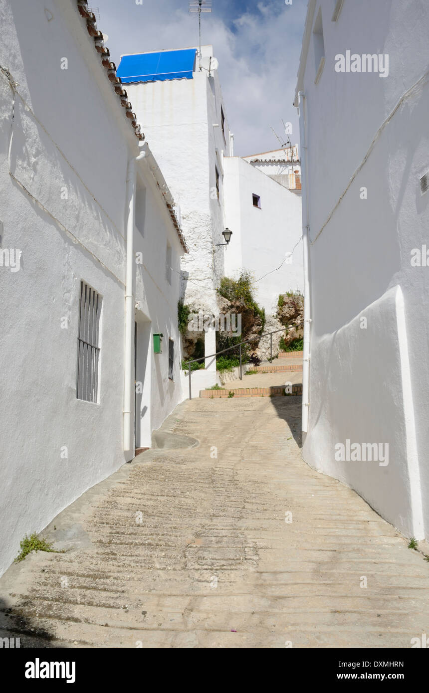 Sloping street in in the white village of Ojen, Andalusia, Spain Stock ...