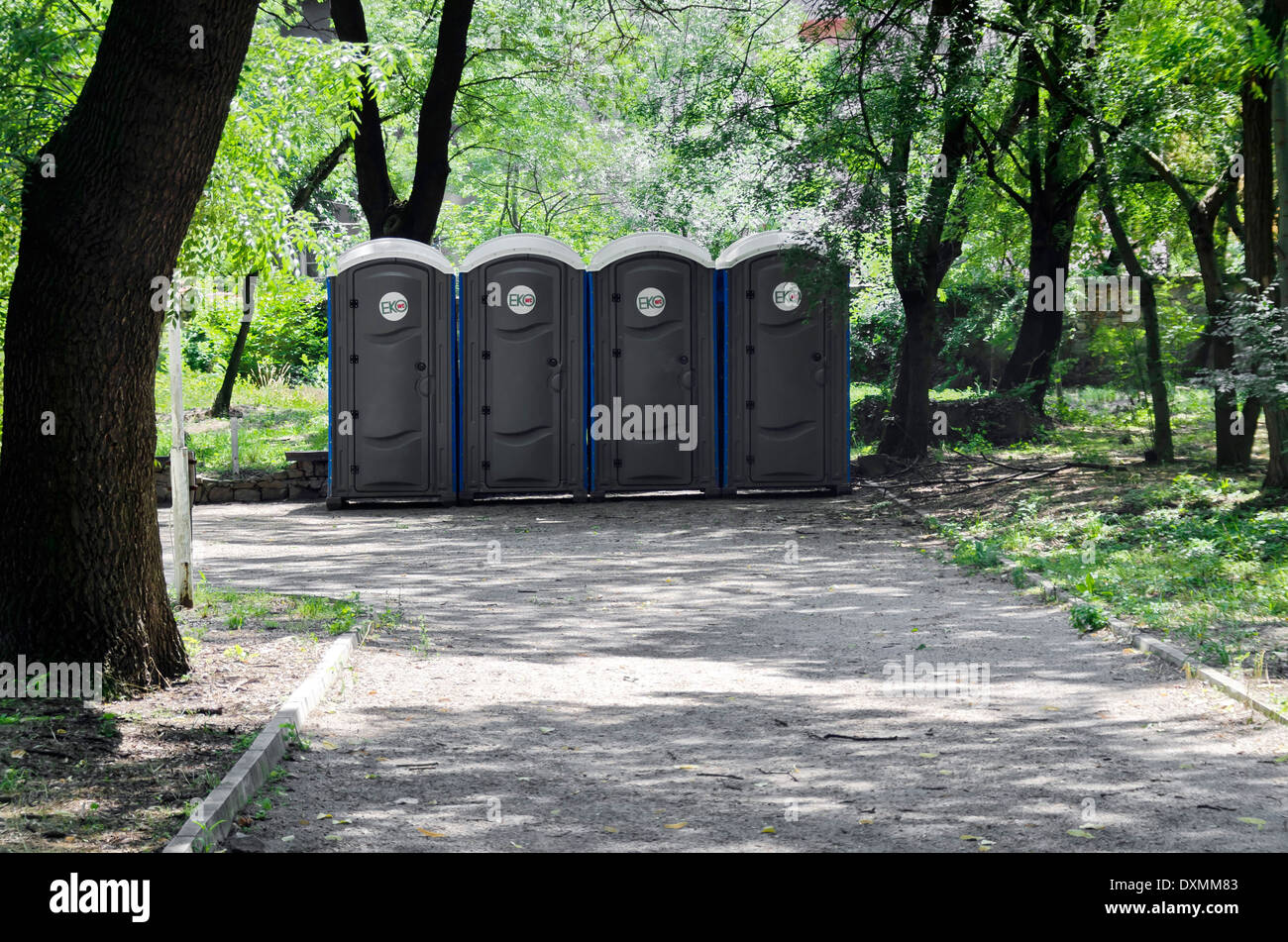 Portable public toilets outdoor in a row Stock Photo - Alamy