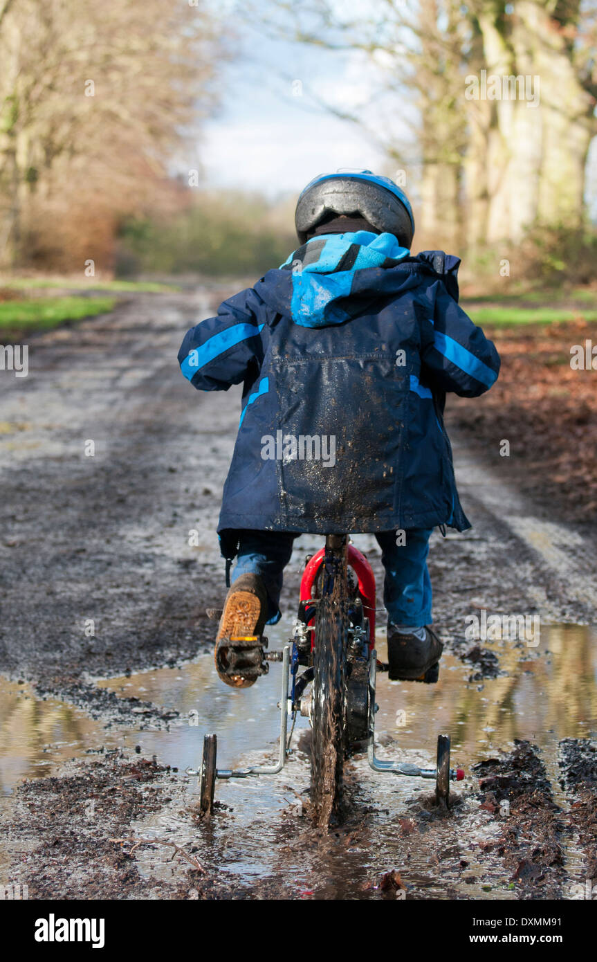 Cycling through puddles hi-res stock photography and images - Alamy