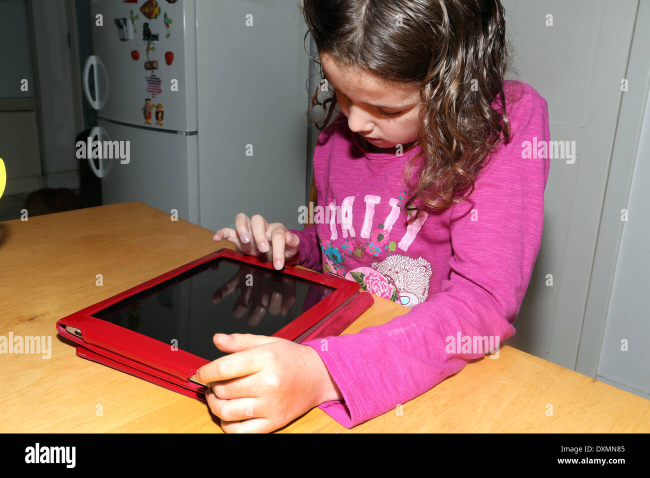Child ipad 8 year old hi-res stock photography and images - Alamy