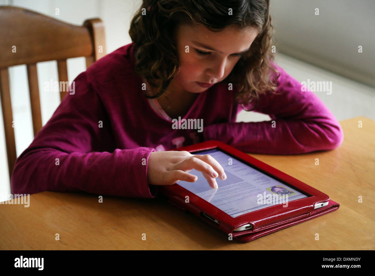 Child ipad 8 year old hi-res stock photography and images - Alamy