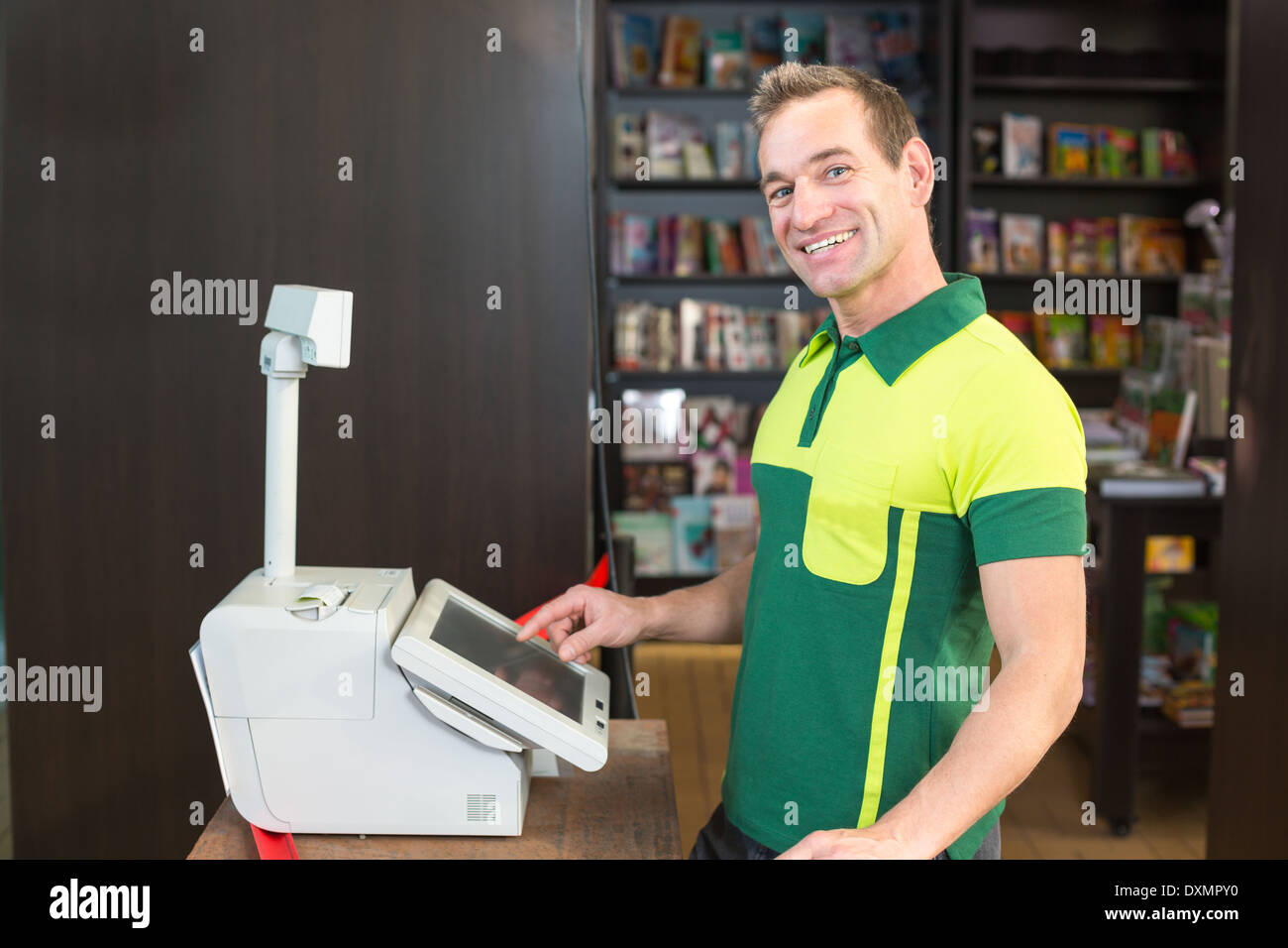 Man cash register hi-res stock photography and images - Alamy
