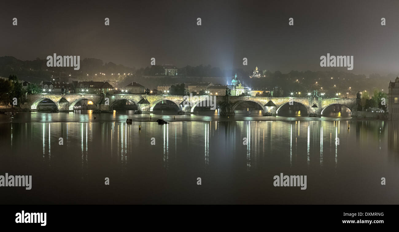 Prague Charles bridge in the night mist Stock Photo - Alamy