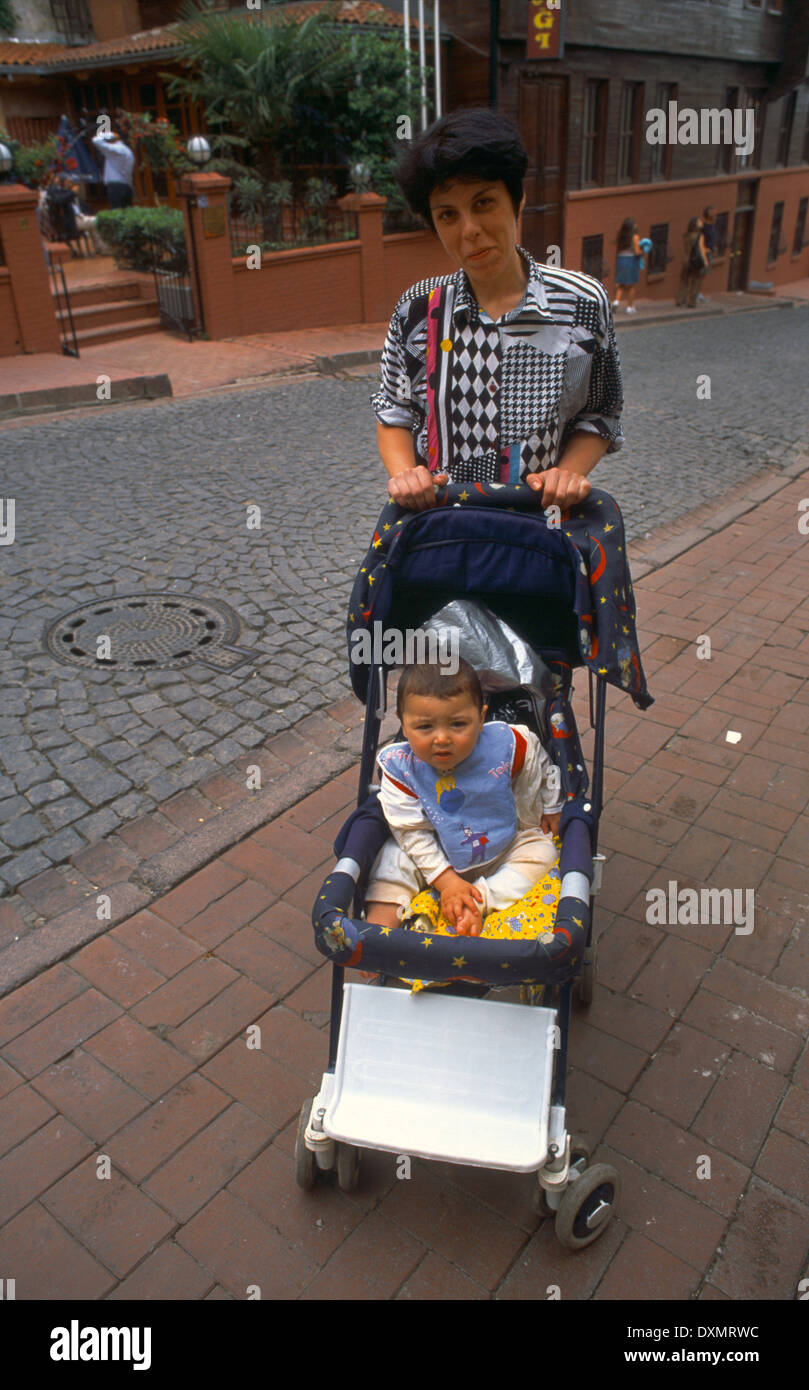 Istanbul Turkey Mother And Child In Pushchair Stock Photo - Alamy