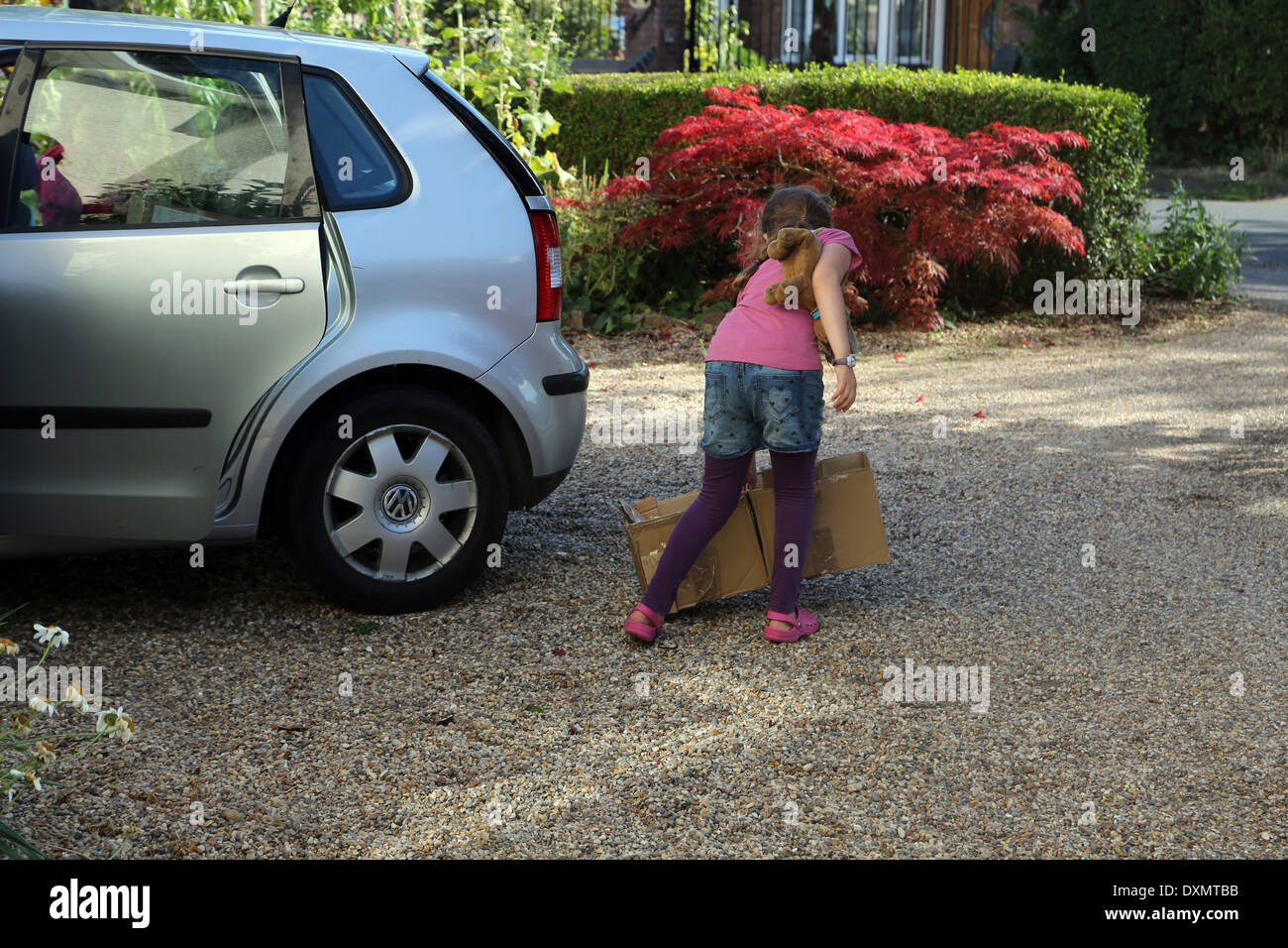 Girl Packing Up Car Ready To Leave Surrey England Stock Photo - Alamy