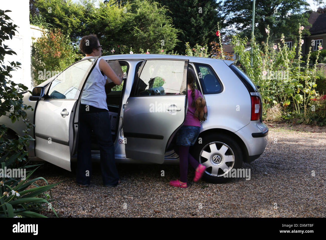 Family Packing Up Car Ready To Leave Surrey England Stock Photo - Alamy