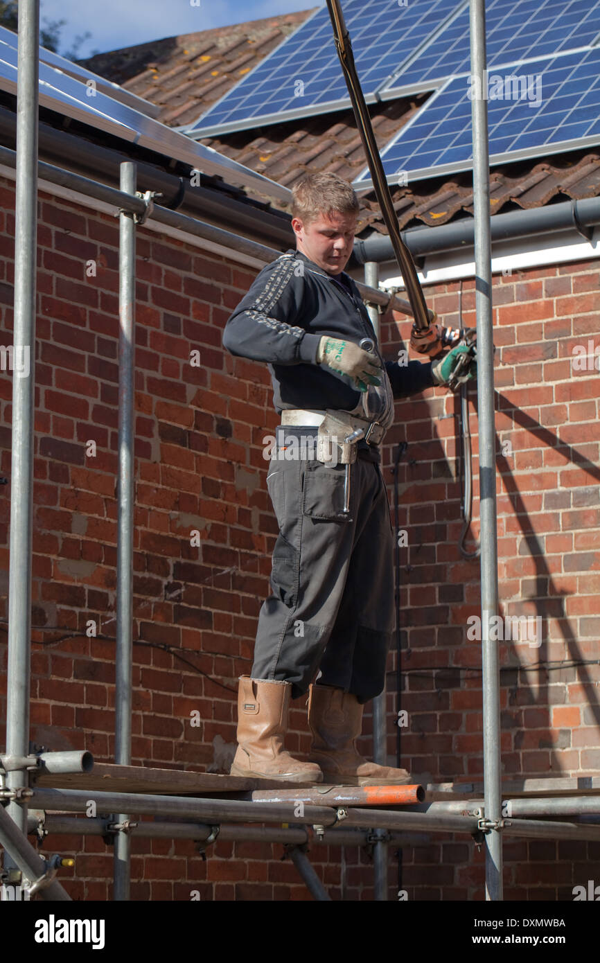 Solar Photovoltaic Panel installation on the pantile roof of a country ...