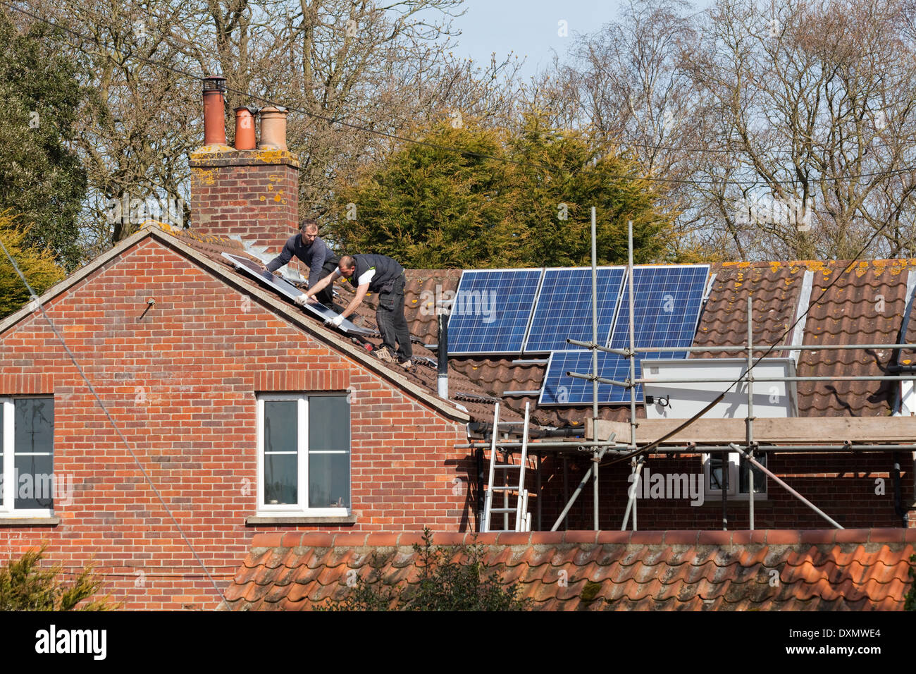 Solar Photovoltaic Panel installation on the pantile roof of a country ...