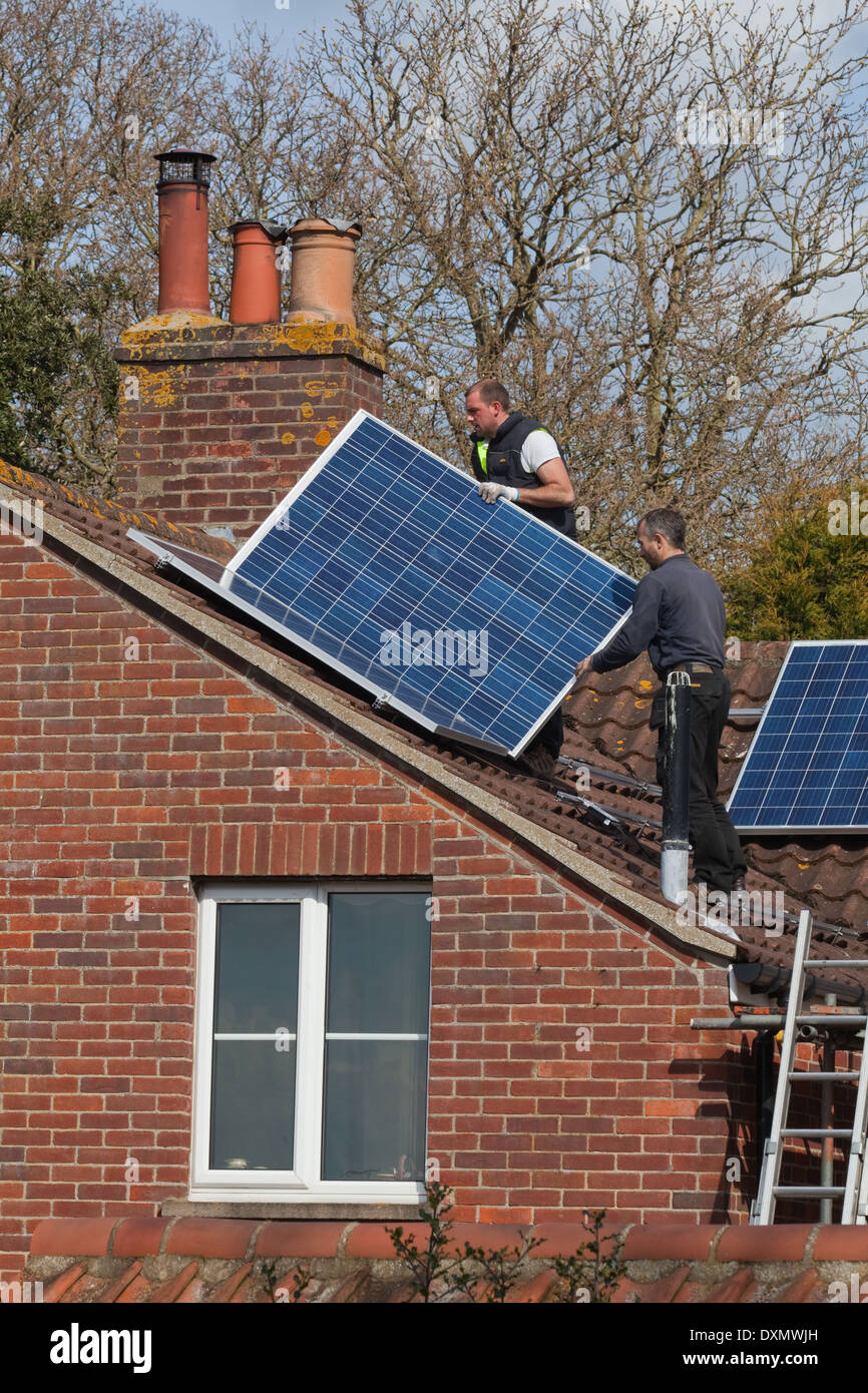 Solar Photovoltaic Panel installation on the pantile roof of a country ...