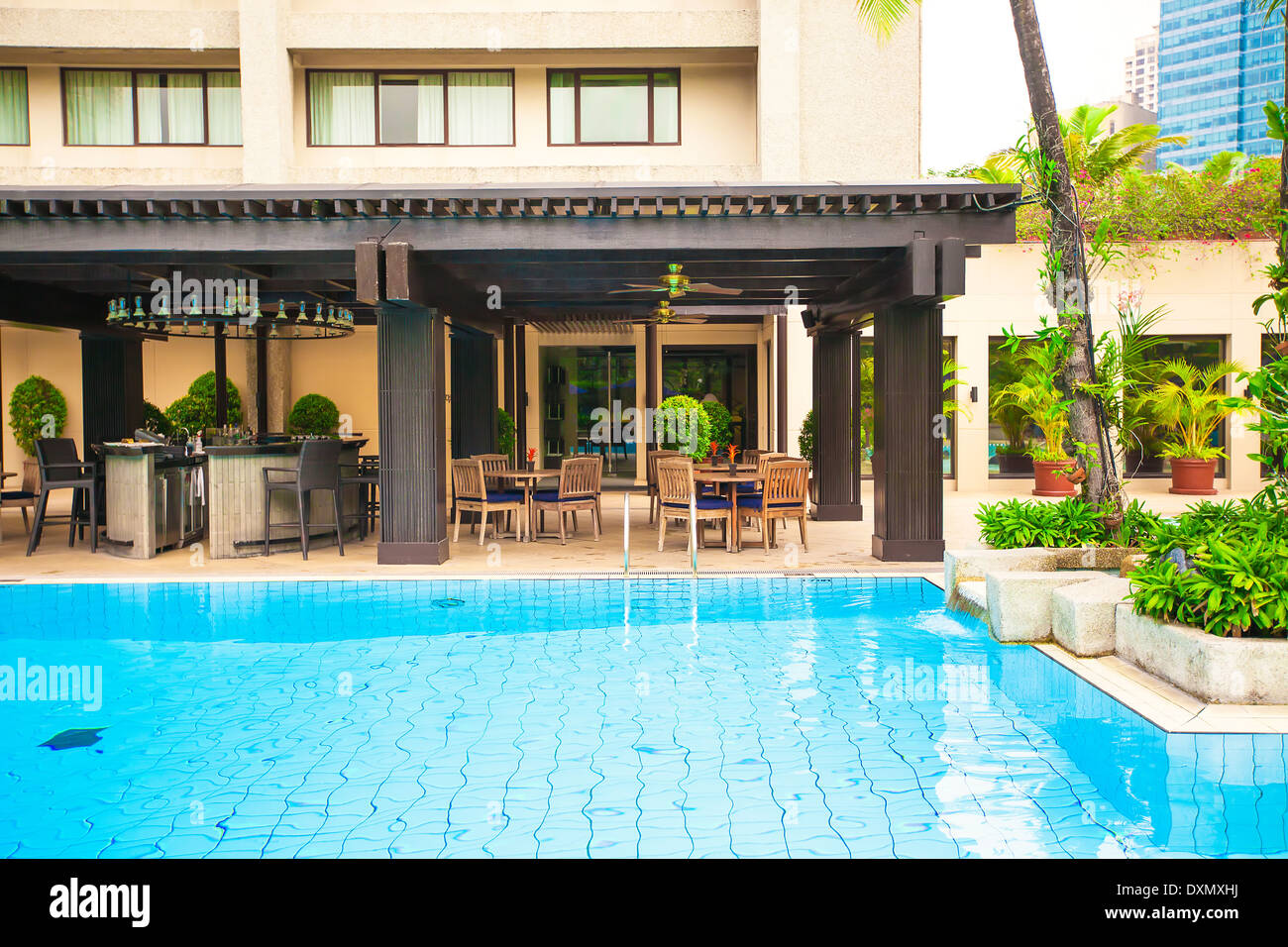 Beautiful view of luxury hotel with an outdoor pool and cafe Stock ...
