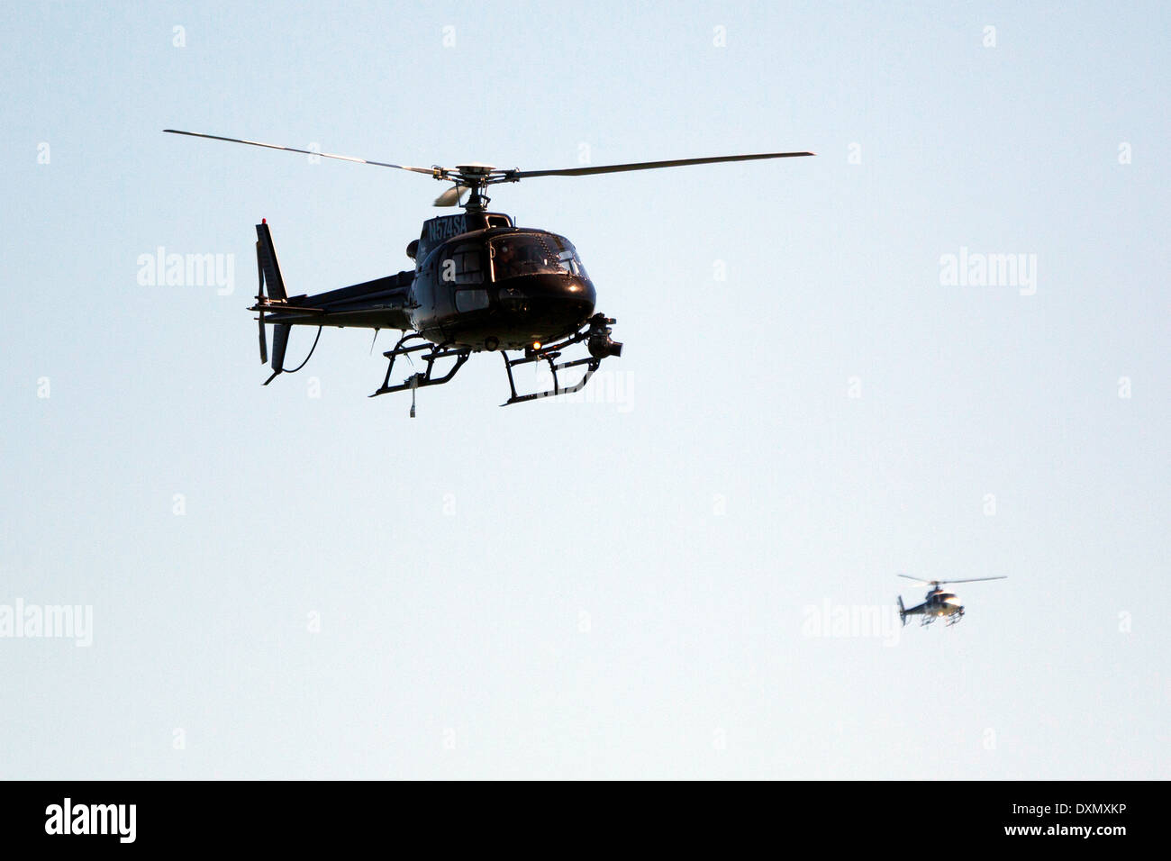 Black television helicopter flying with mounted camera, San Francisco ...