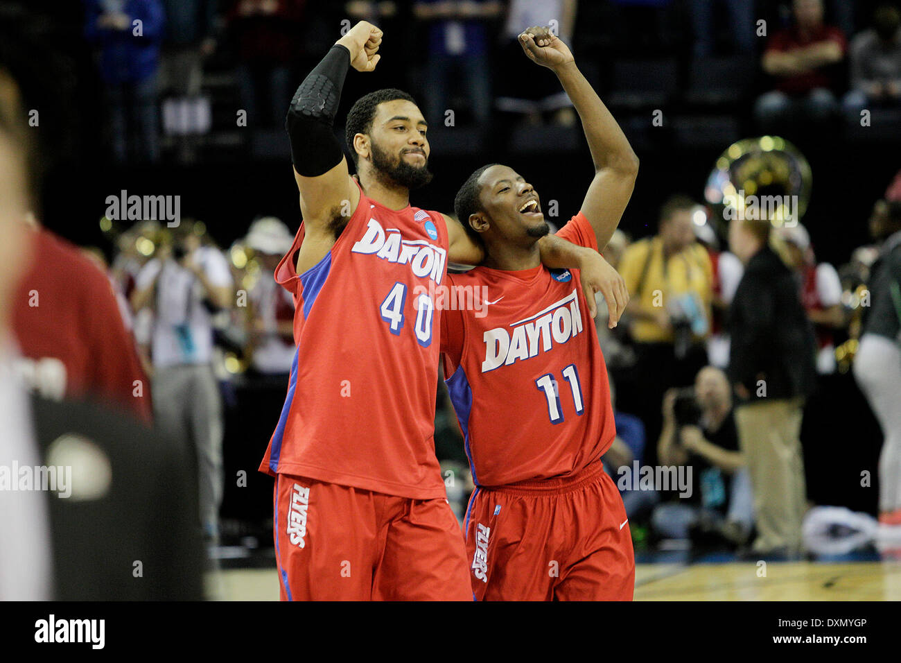 Memphis, Tennessee, USA. 27th Mar, 2014. Dayton players Devon Scott (40 ...