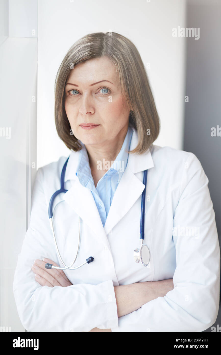 Portrait of successful female practitioner looking at camera Stock ...