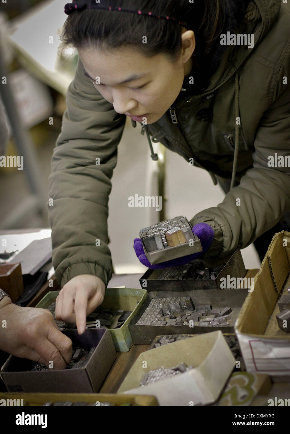 Vancouver, Canada. 27th Mar, 2014. An antique collector looks for ...