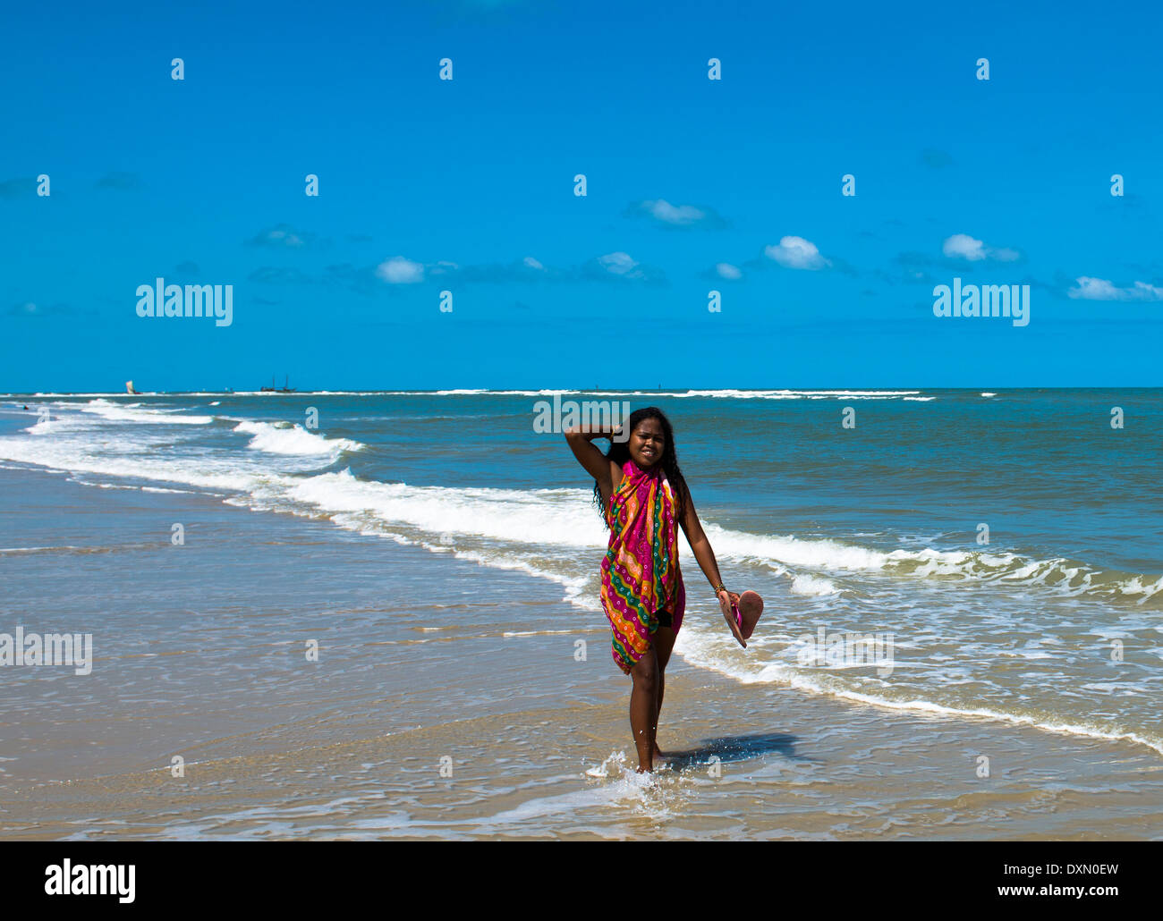 A Malagasy beauty walking on the beach in Morondava, Madagascar Stock ...