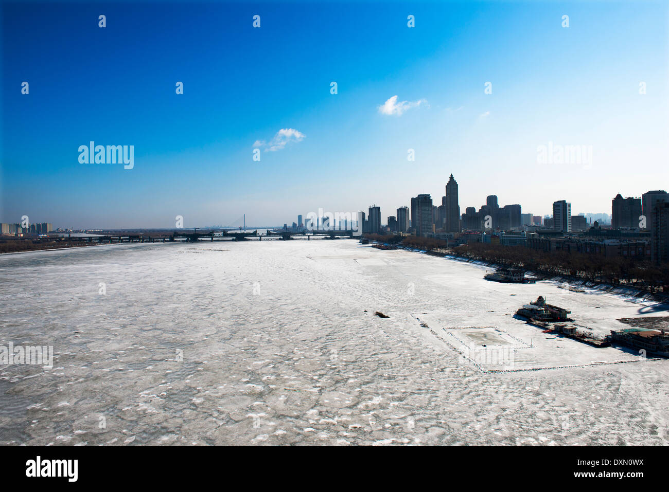 An aerial view of the Songhua river and the center of Harbin Stock ...