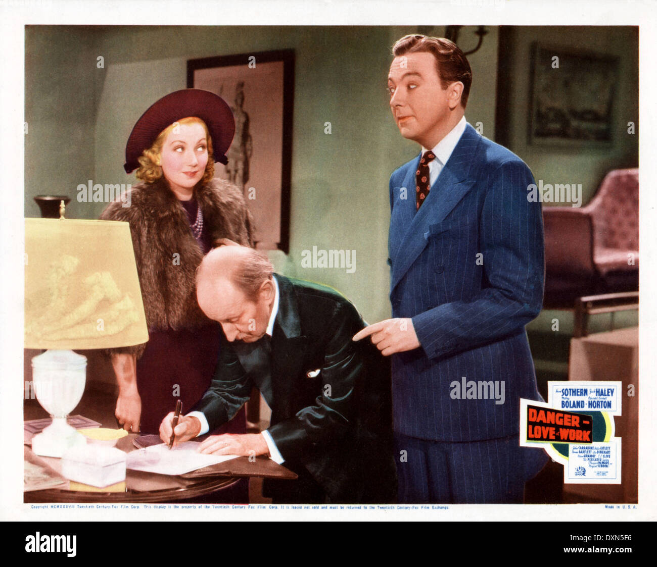 DANGER - LOVE AT WORK Stock Photo - Alamy