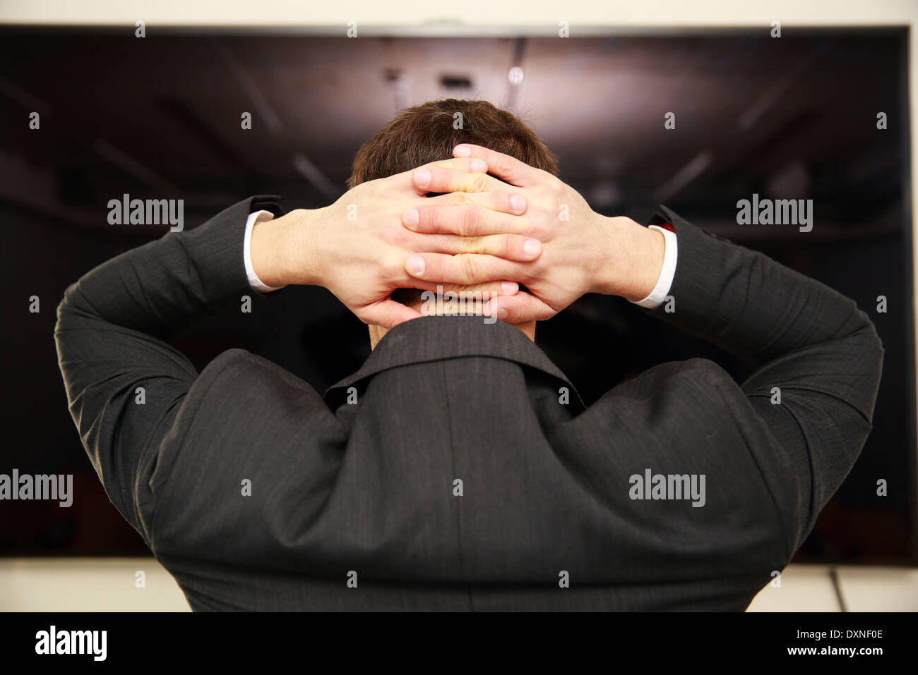 Arms behind head hi-res stock photography and images - Alamy