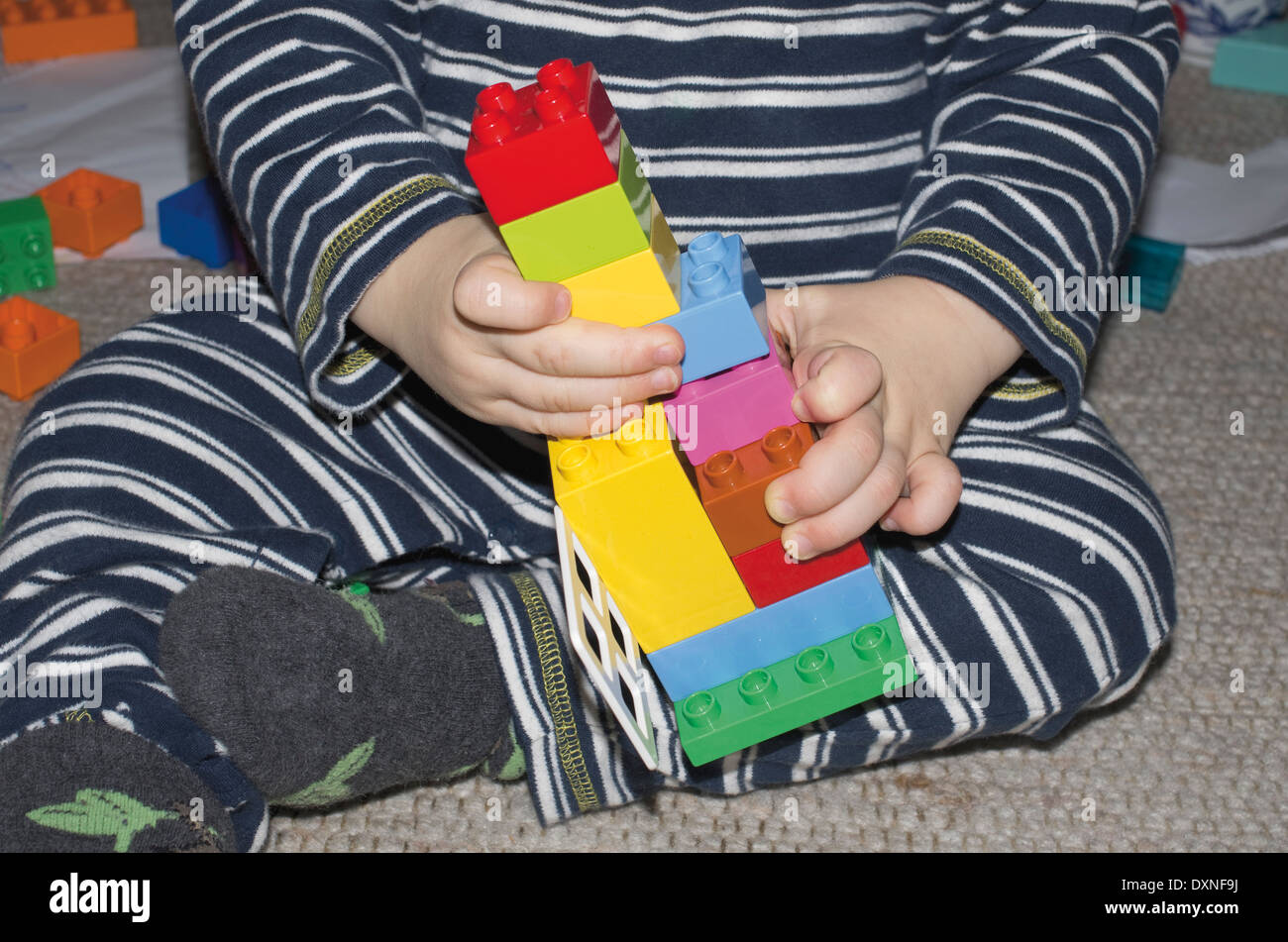 Boys playing lego hi-res stock photography and images - Alamy