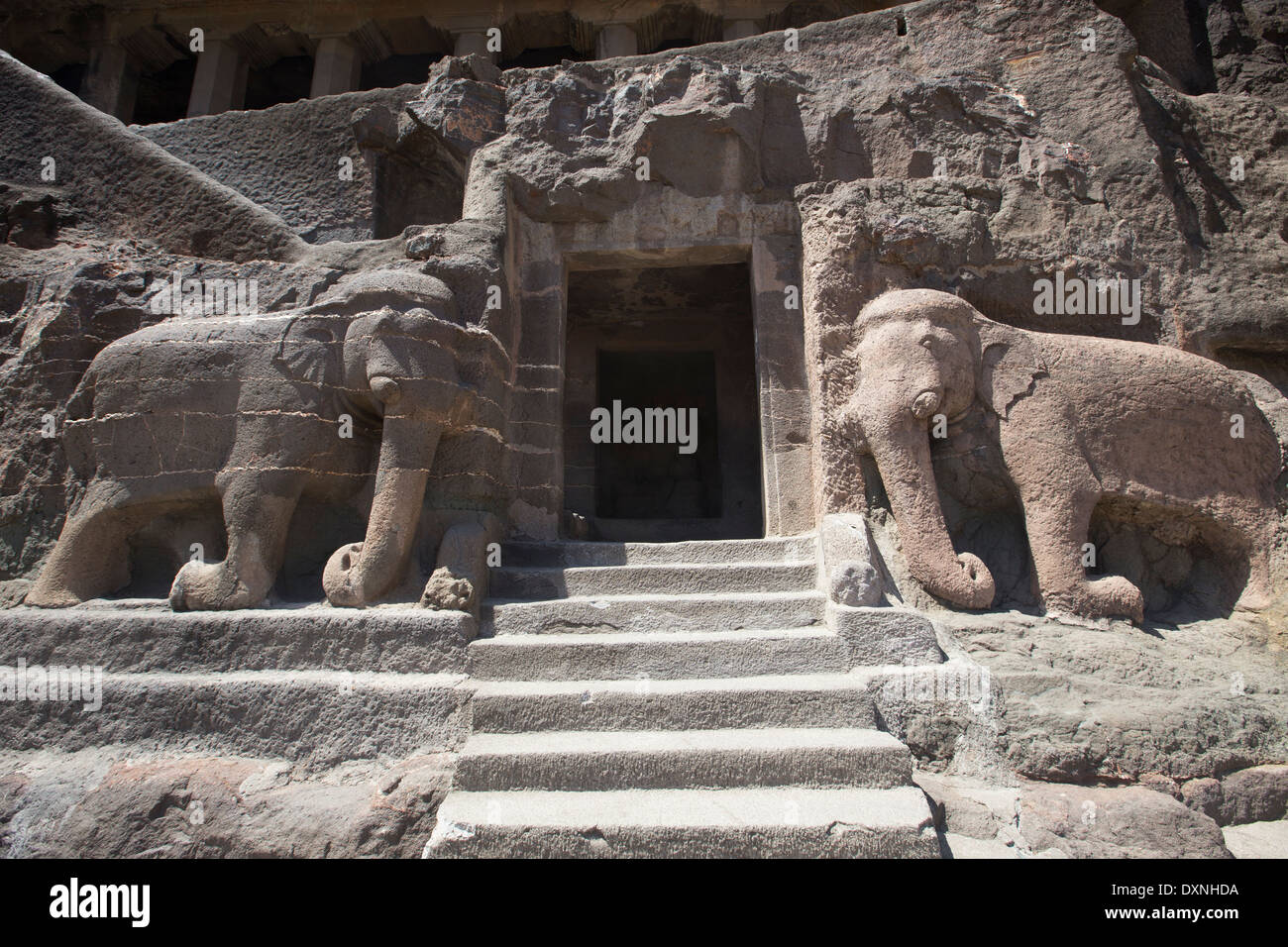Elephant carvings flank a set of steps in Ajanta Buddhist Caves, India ...